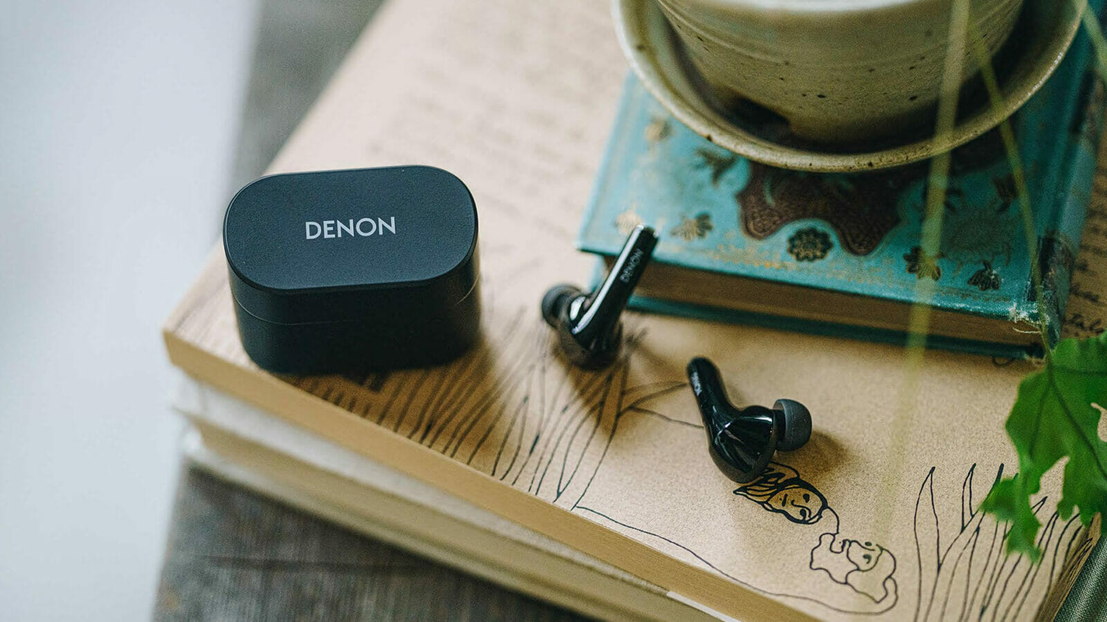Denon debuts in-ear buds - Audiograde